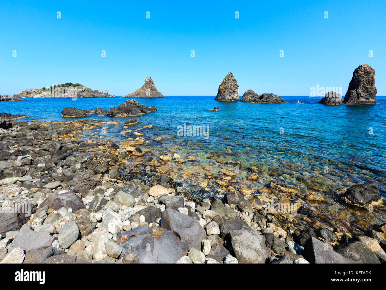 Cyclopean Coast and the Islands of the Cyclops on Aci Trezza town ...