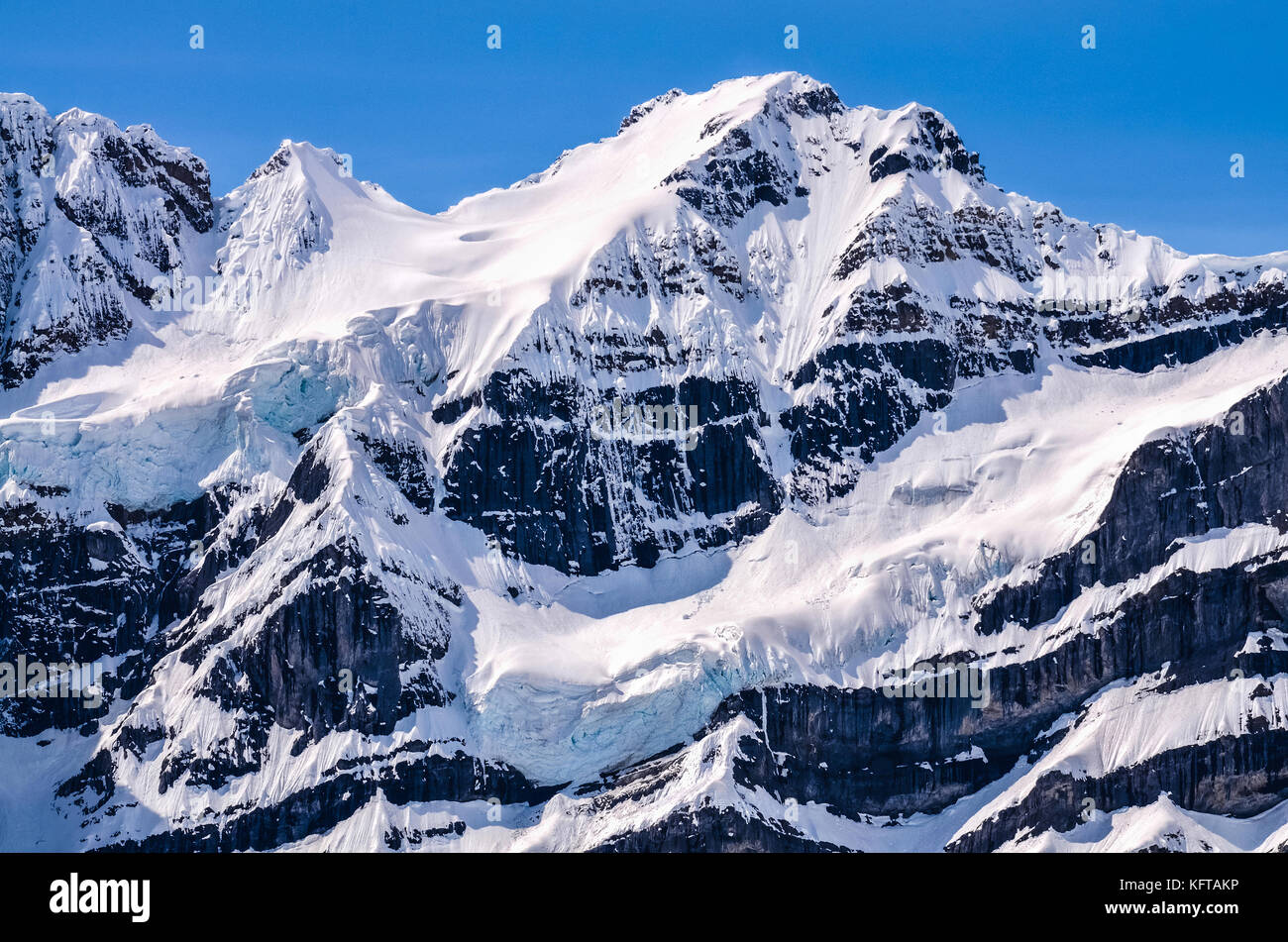 Snow covered mountain landscape with glacier hi-res stock photography ...