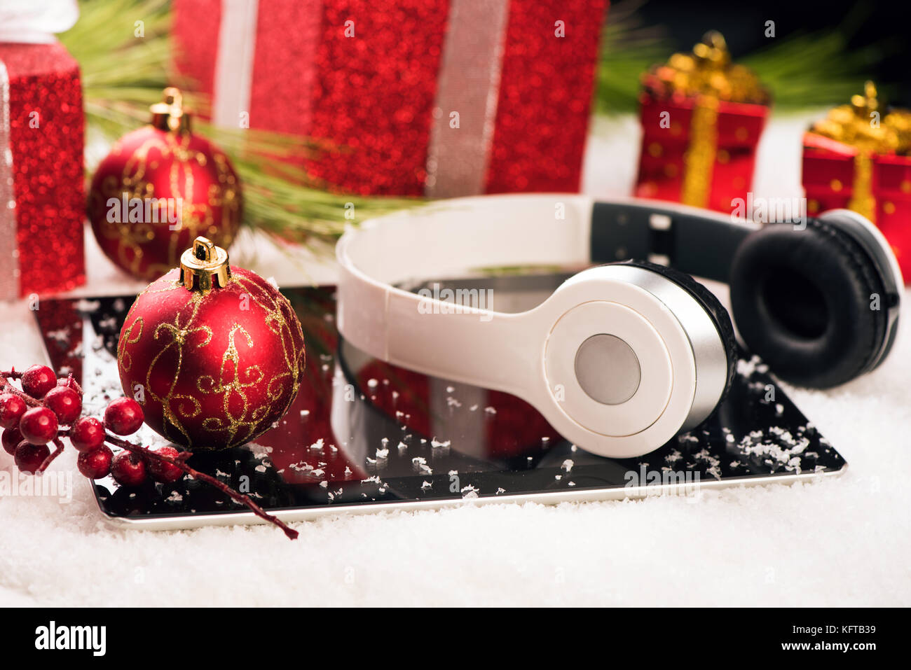 Tablet and headphone best christmas gift concept Stock Photo - Alamy