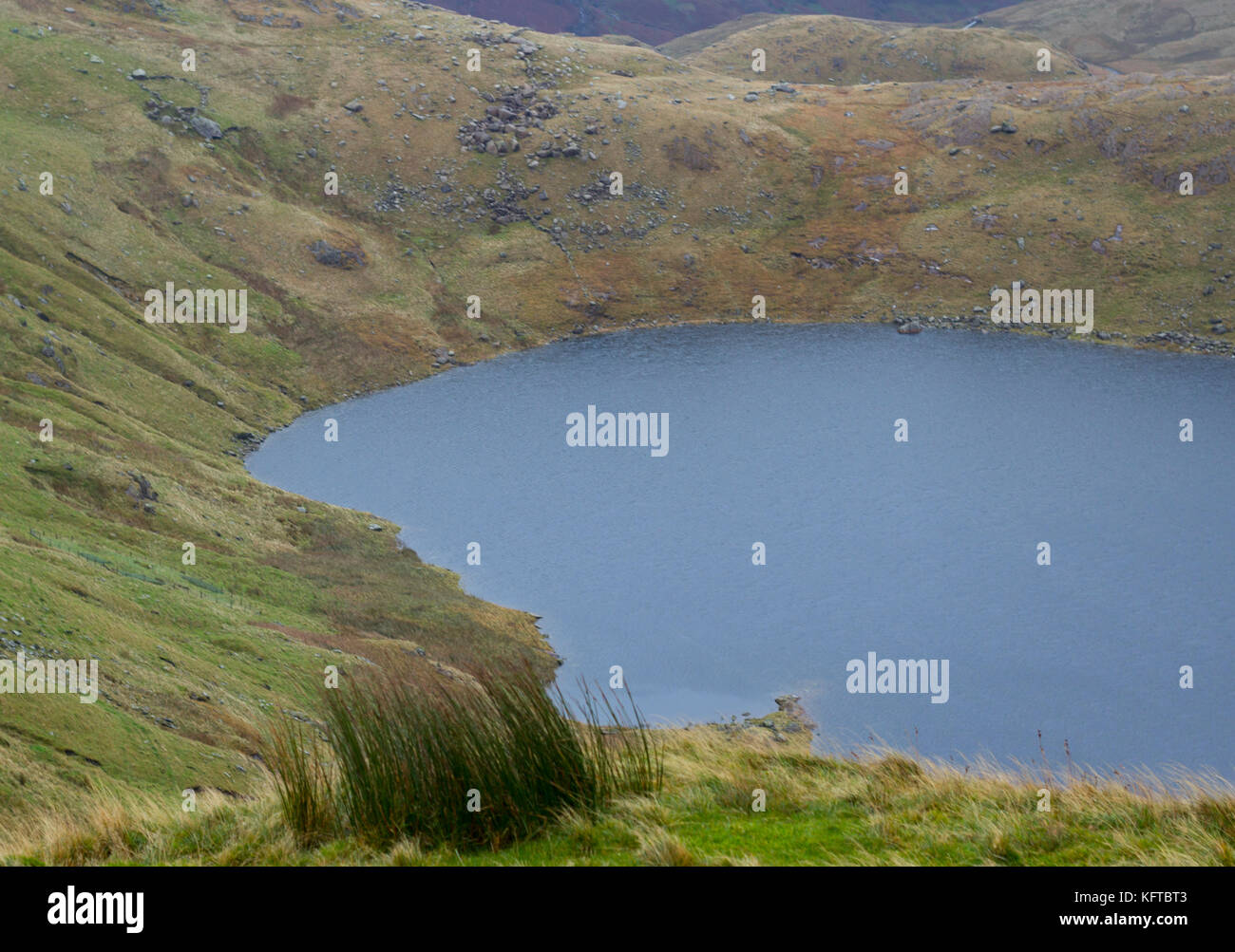 View of the lake from half way up Crib Goch Stock Photo - Alamy
