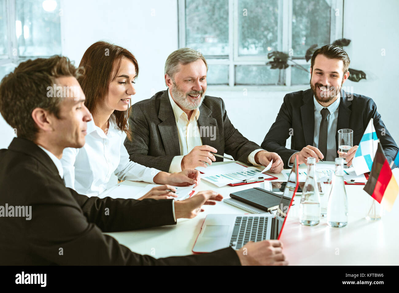 Business people working together Stock Photo - Alamy