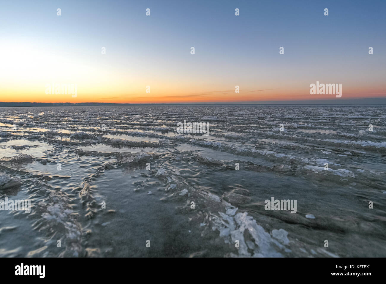 as waves from the strong wind and a frost become solid and save ...