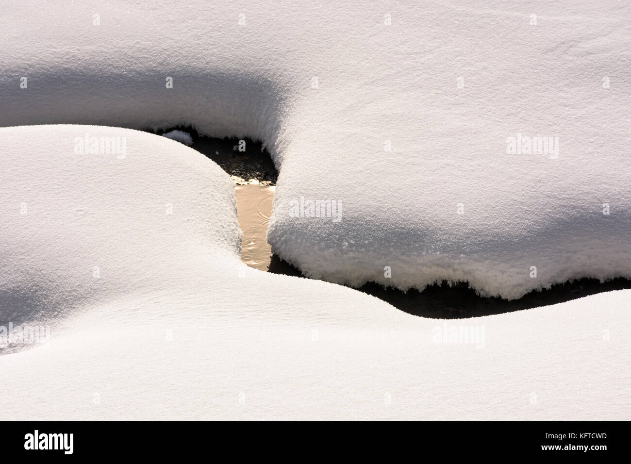 fancy snow layout on the shore of brook. beautiful and unusual ...