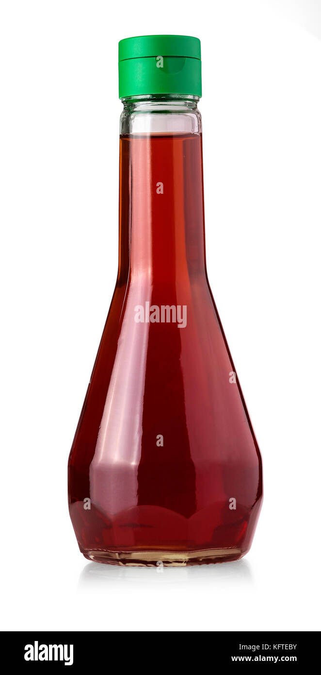 Glass bottle of vinegar isolated on white background with clipping path ...