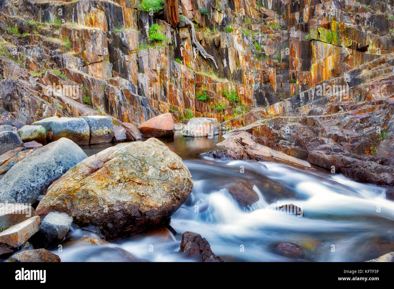 Glen Alpine Creek and multi colored rock wall. California Stock Photo ...