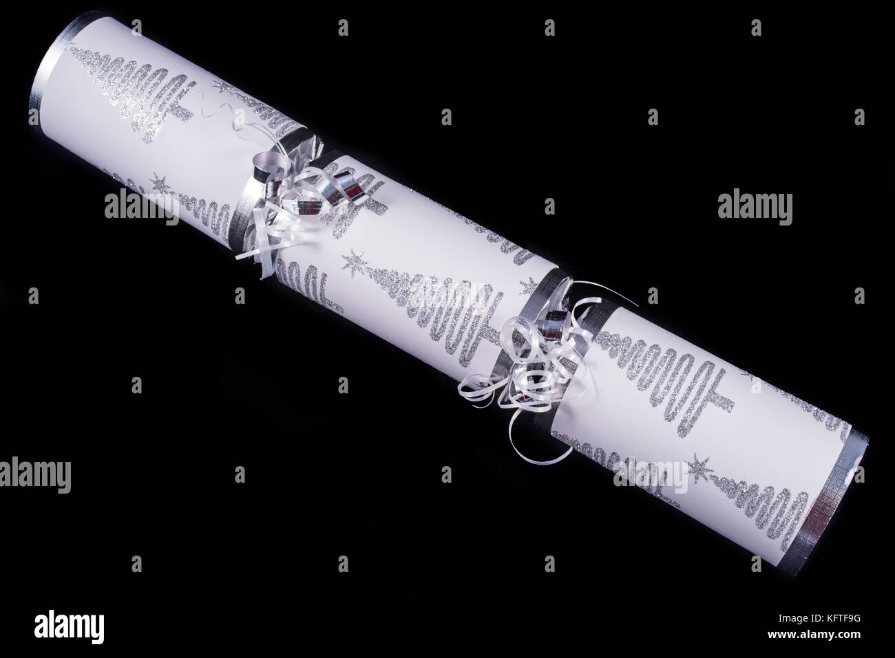 A studio shot of a Christmas Cracker or otherwise known as a Bon Bon. A ...