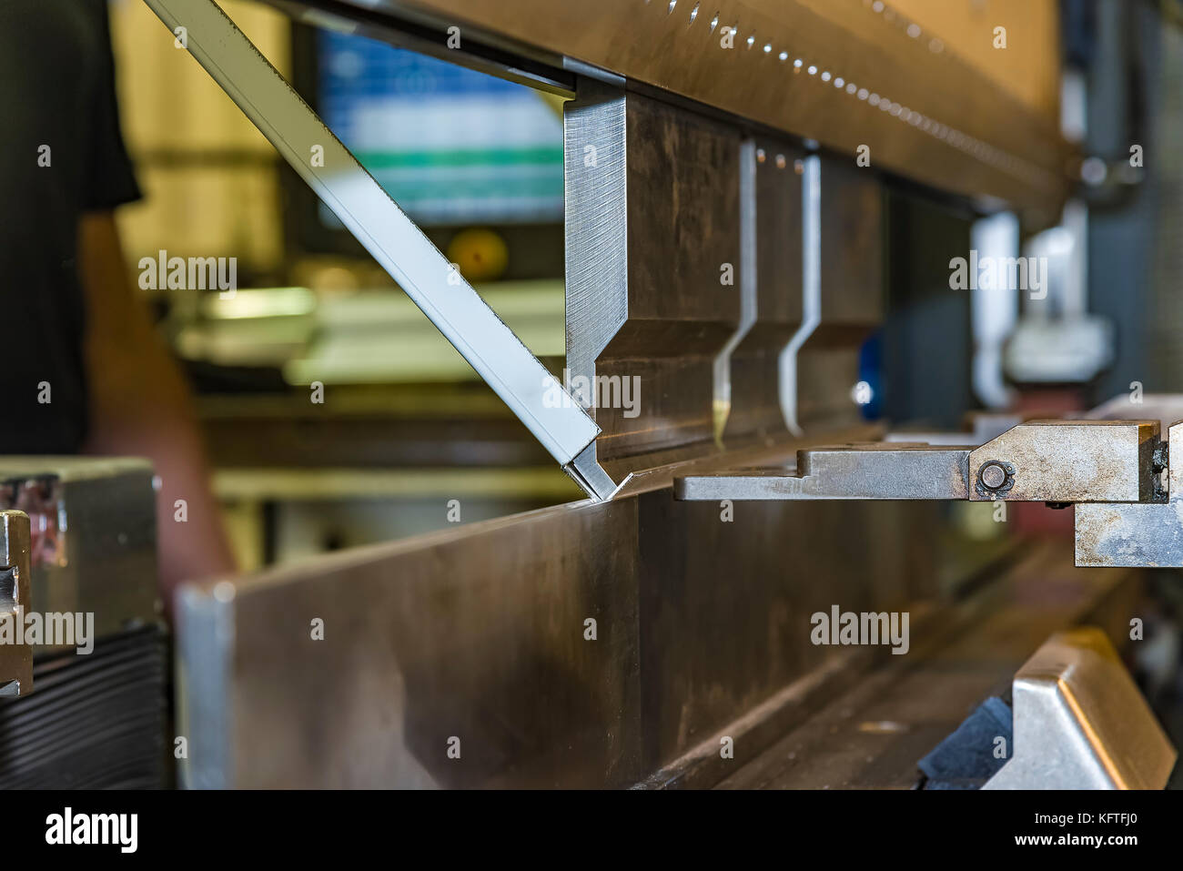 worker operating metal press machine at workshop Stock Photo - Alamy