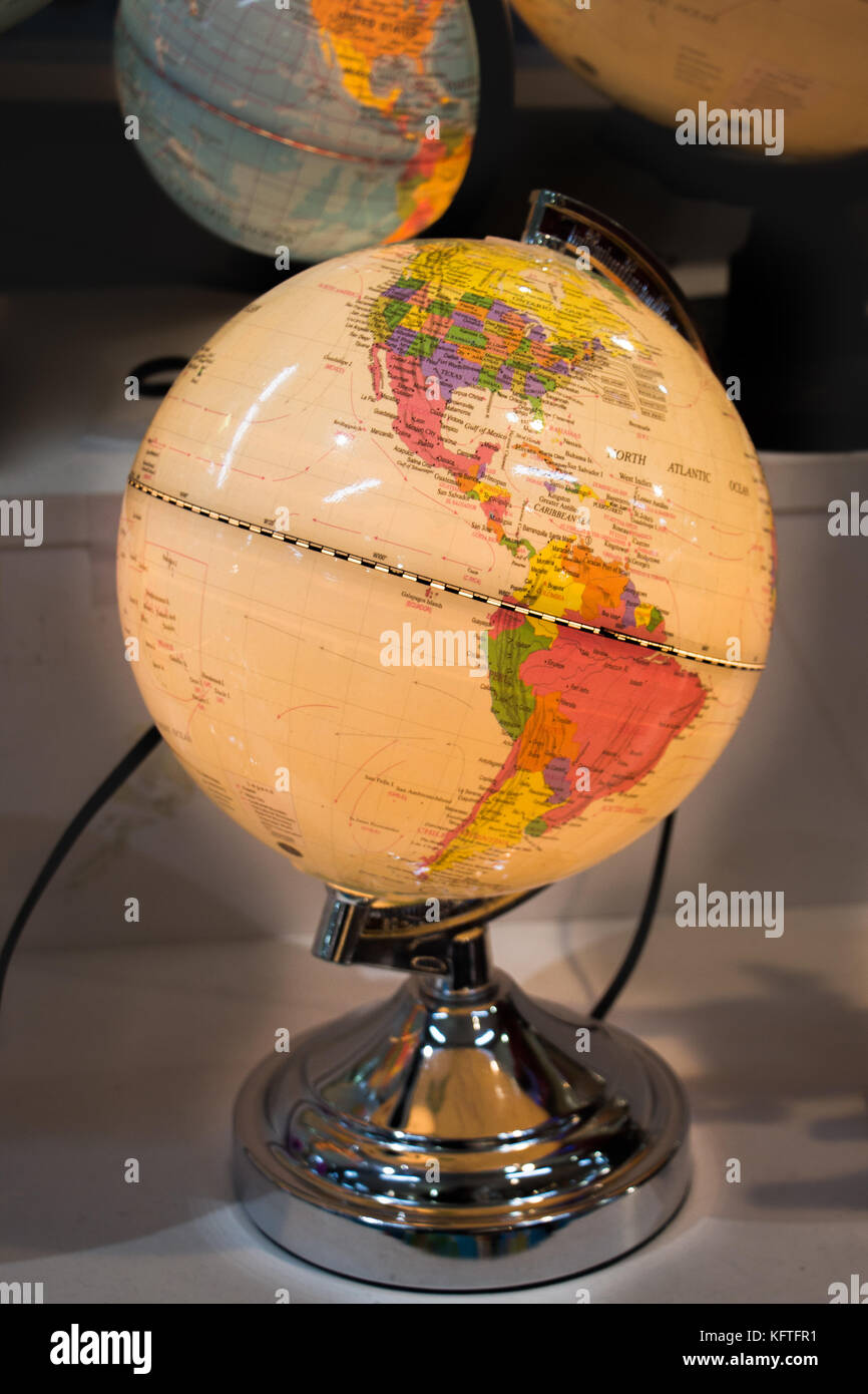 Little colorful model globe with maps on it Stock Photo - Alamy