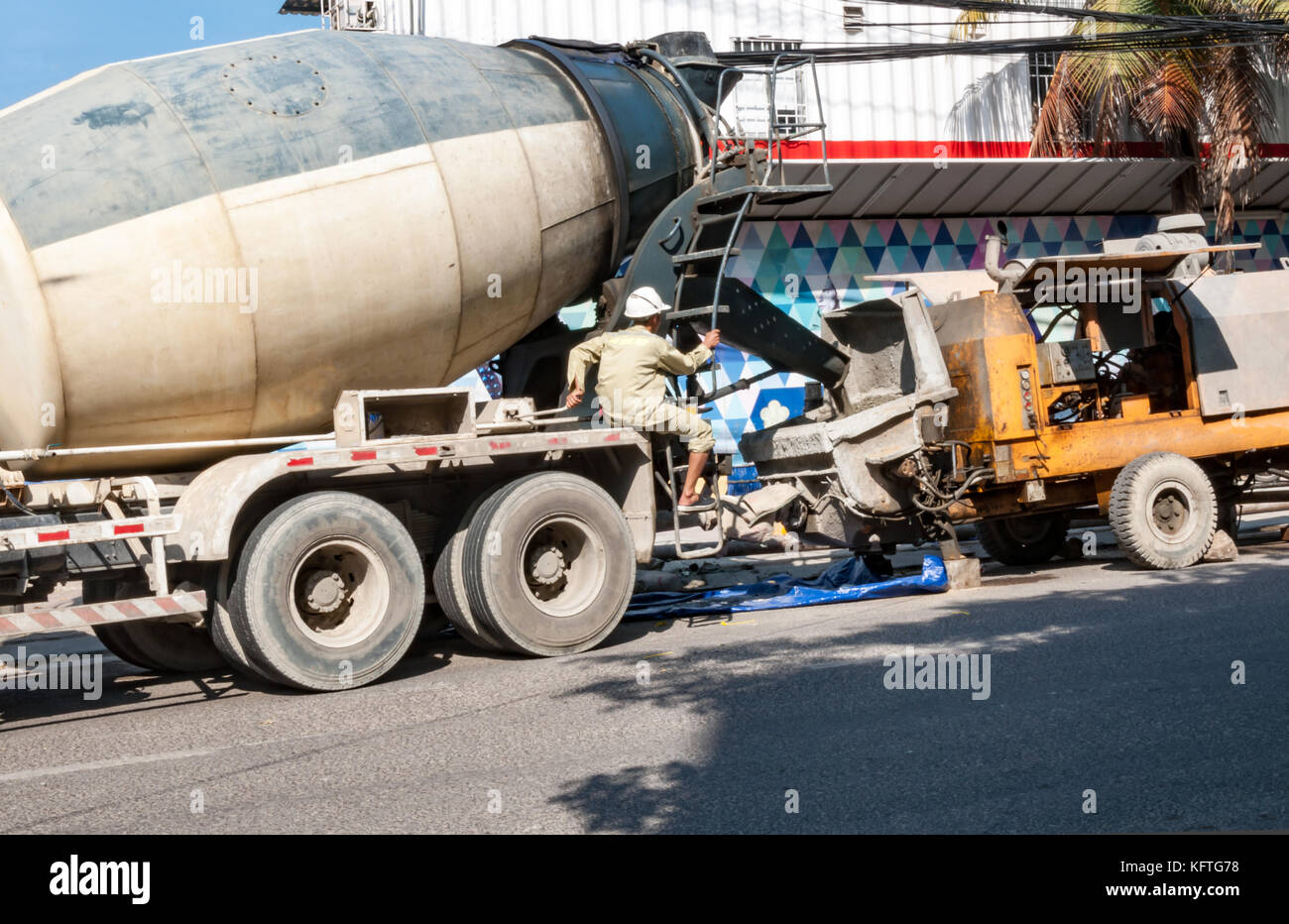 Construction worker controls flow concrete hi-res stock photography and ...