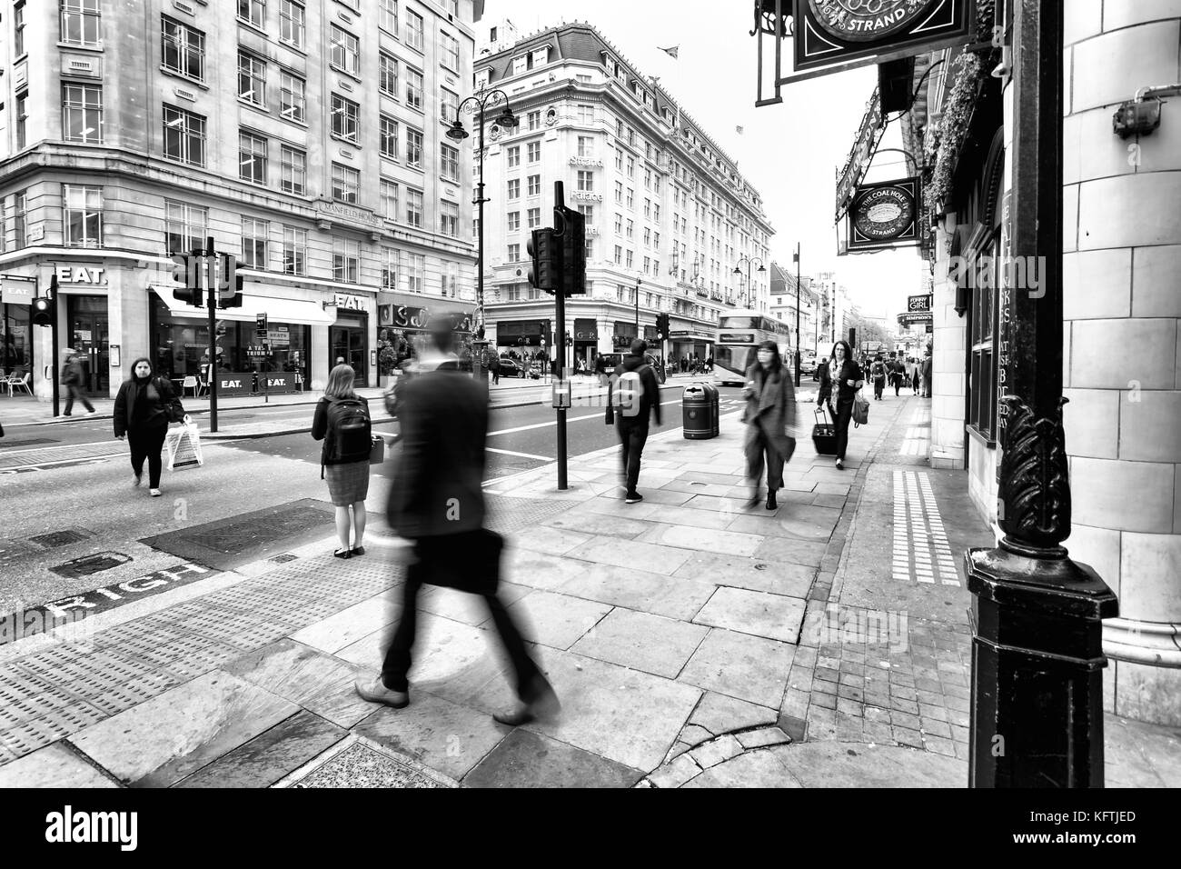 People walking on the Strand street in London, UK Stock Photo - Alamy