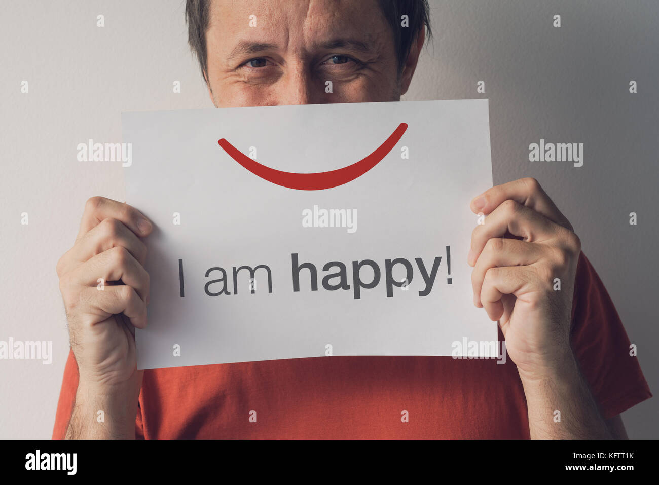 Happy smiling man, real people portraits. Adult caucasian male hiding ...