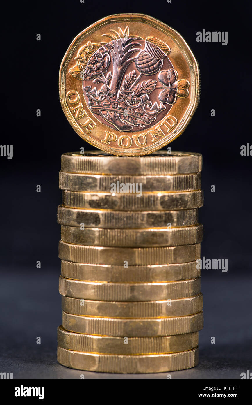 A pile of British one Pound coins Stock Photo - Alamy