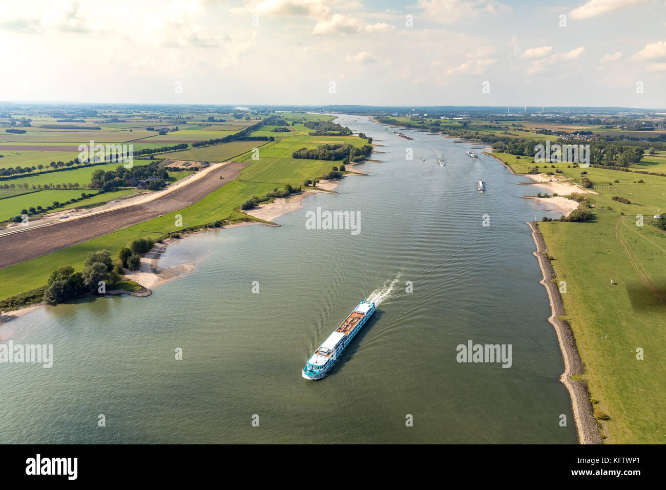 Rhine at Emmerich with cargo ships, inland waterway, the Rhine ...