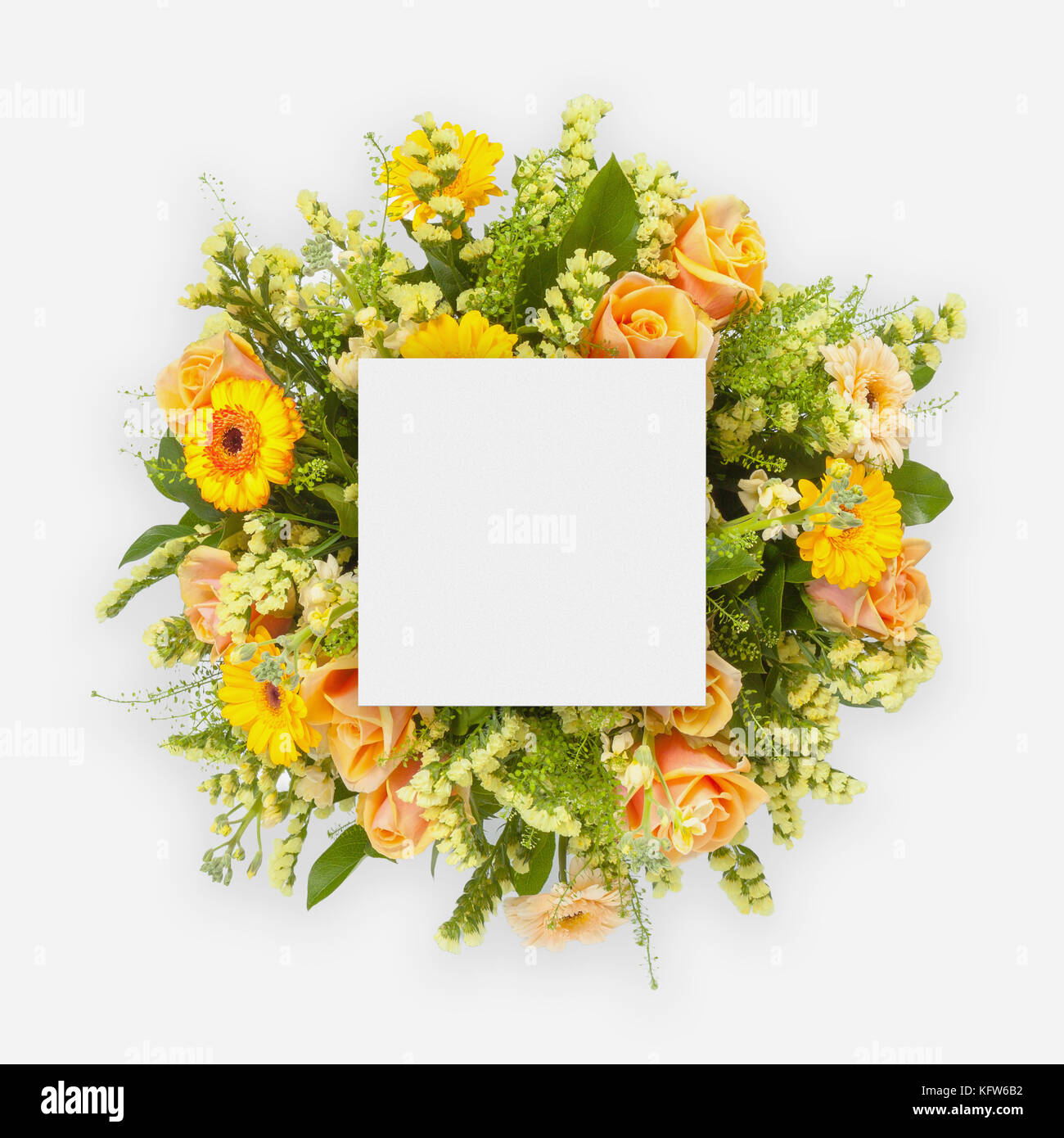 Creative layout with colorful flowers, leaves and copy space card note ...