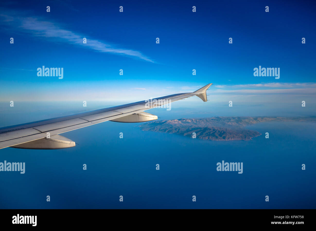 Amazing view from the plane window at the sky.Flight over the aegean ...
