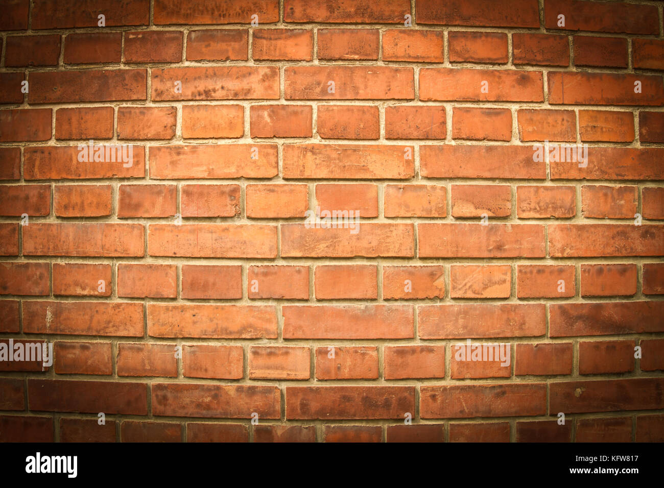 Round brick wall with vignette effect Stock Photo - Alamy