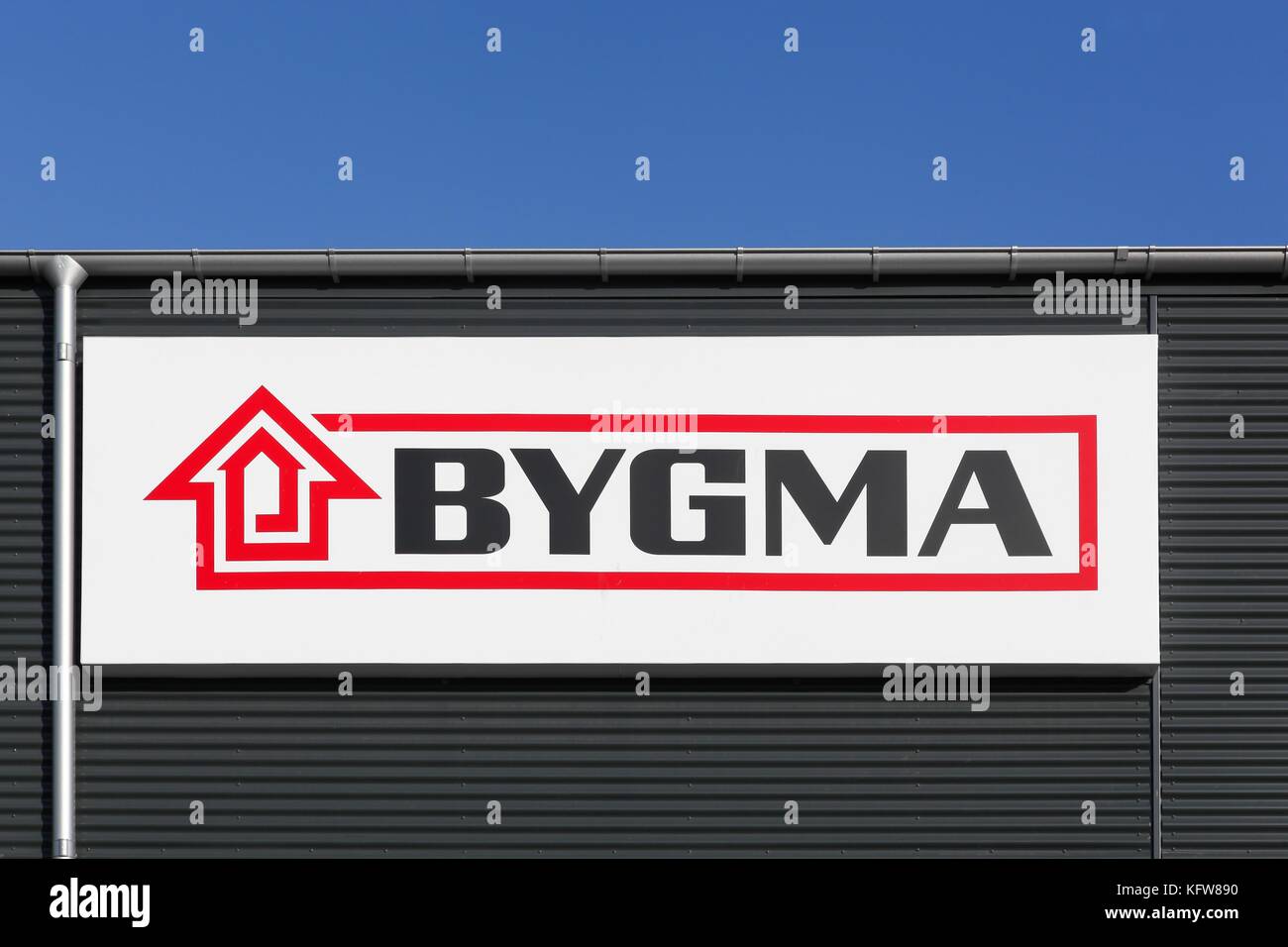 Aalborg, Denmark - July 13, 2017: Bygma logo on a wall. Bygma is the ...