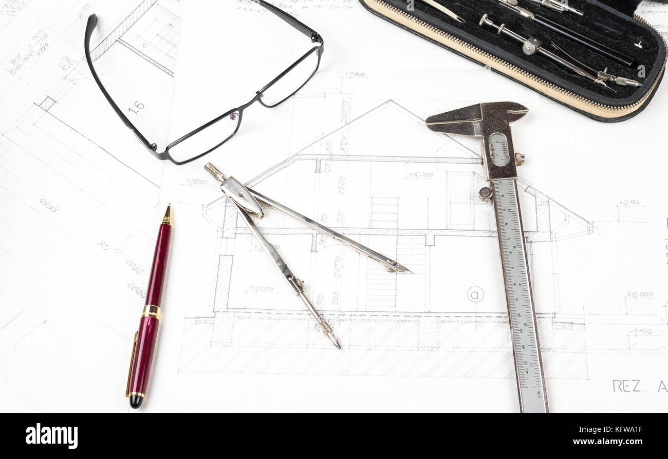 Engineer and Architect drawings blueprint at Construction Site.Home ...