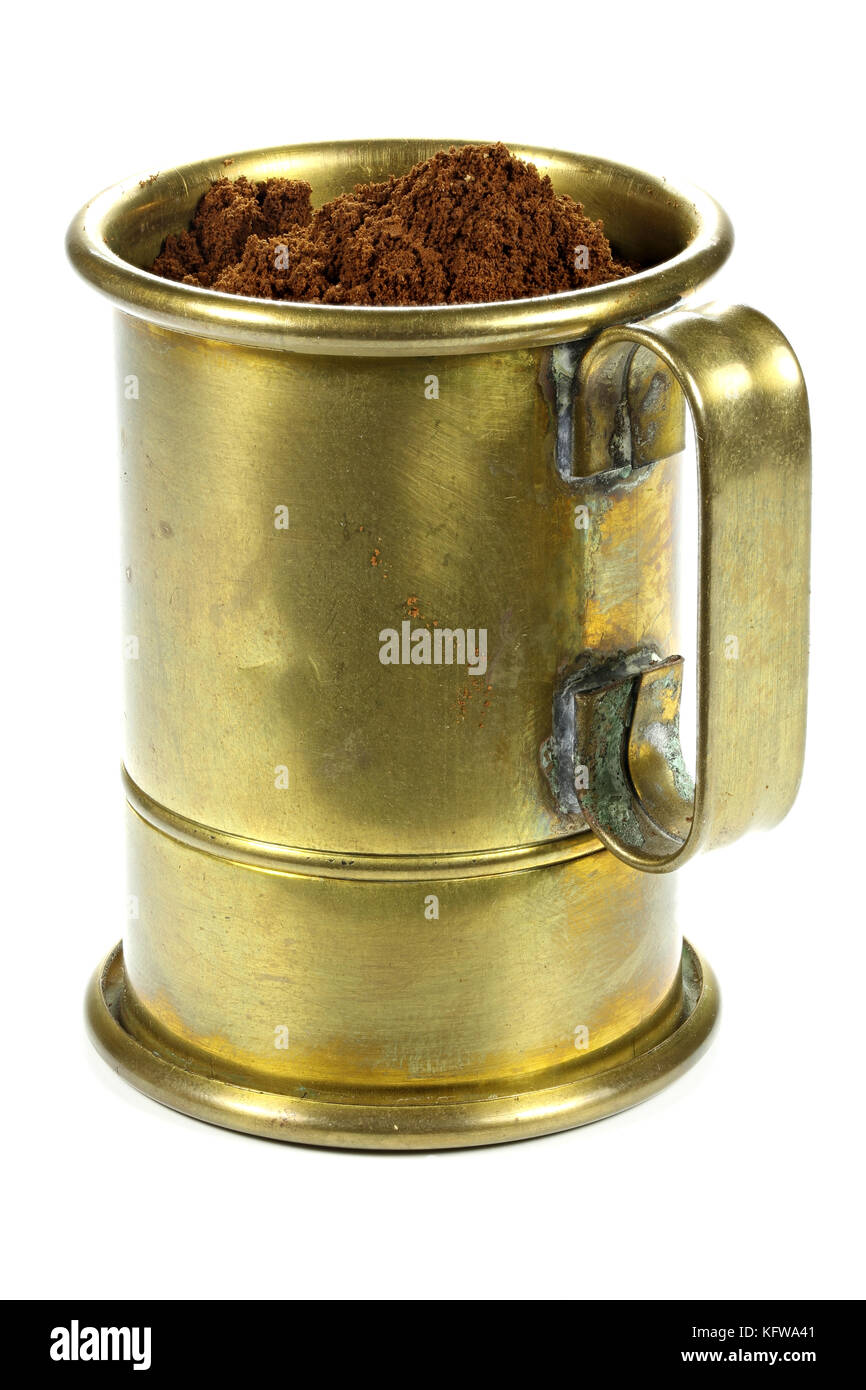 vintage German brass coffee measuring cup isolated on white background ...