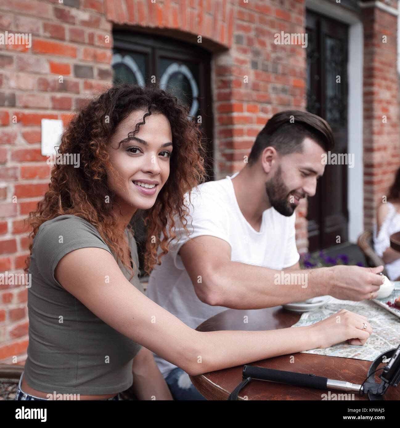 Young couple using mobile smartphones in cafe Stock Photo - Alamy