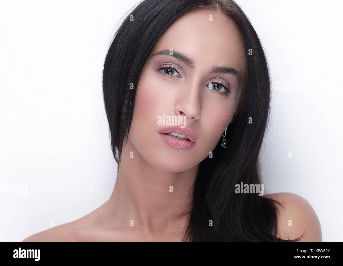 beautiful woman in the studio on a white background Stock Photo - Alamy