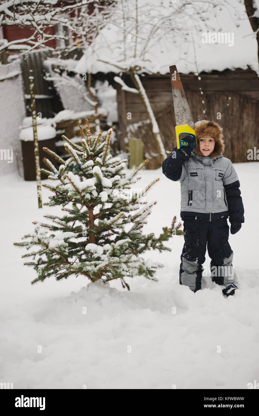 Boy with saw hi-res stock photography and images - Alamy