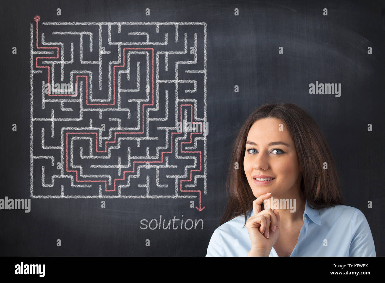 Young business woman find the way out Stock Photo - Alamy