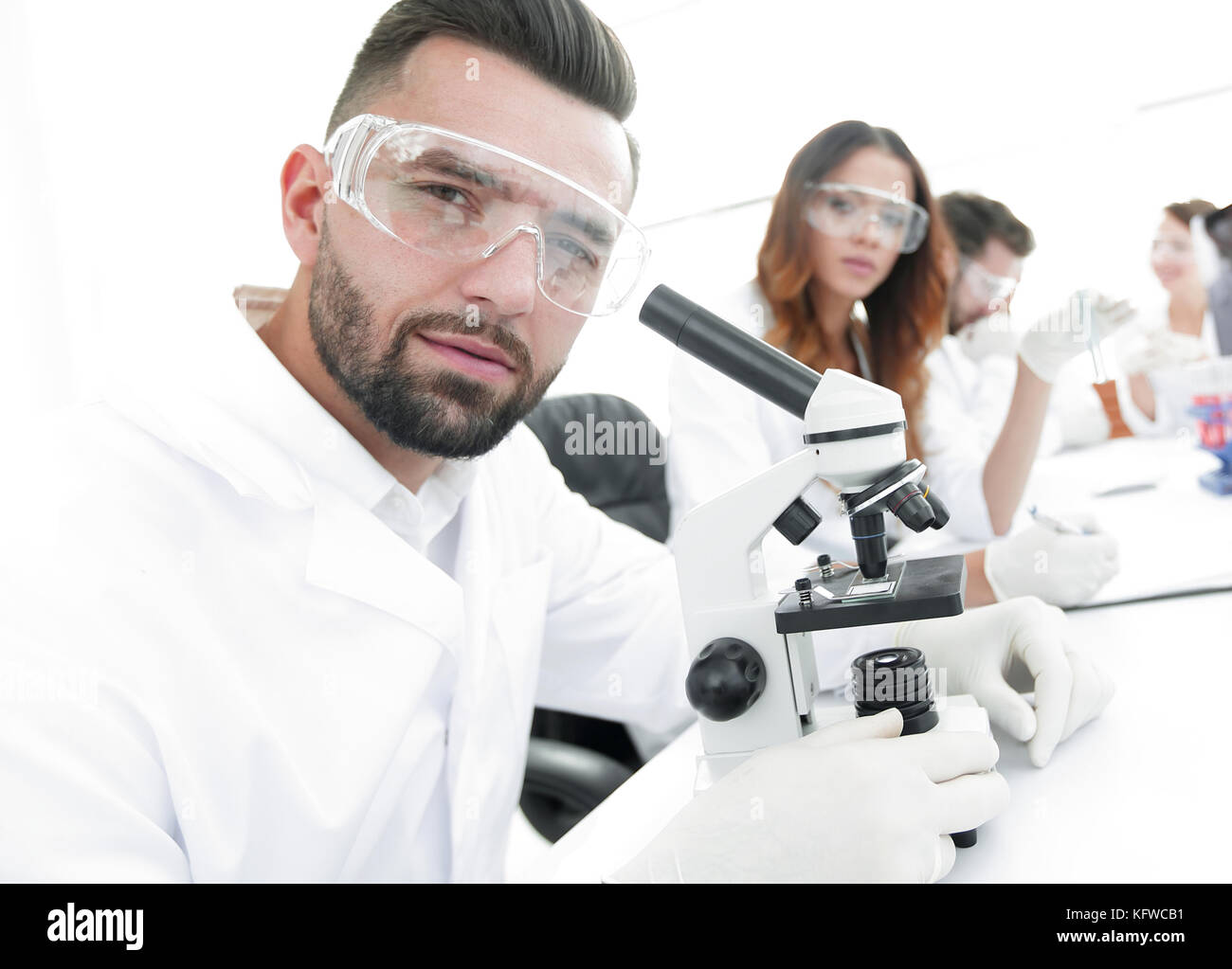 close-up of a scientific researcher with microscope Stock Photo - Alamy