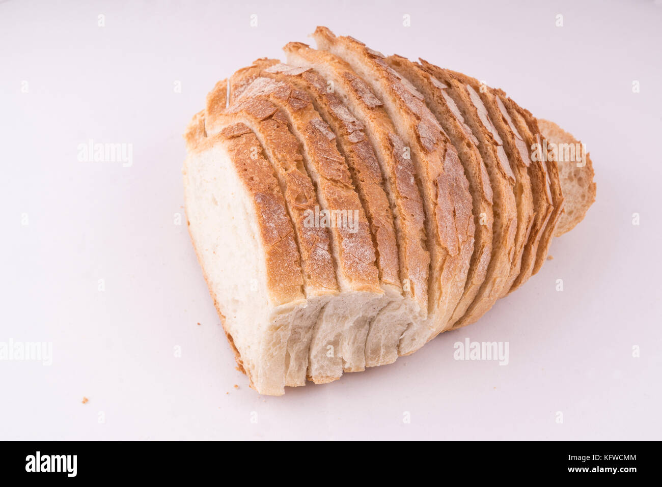 Bread on a white table Stock Photo - Alamy