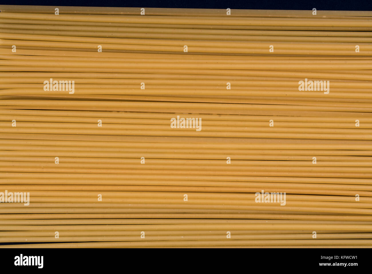 Spaghetti pasta as a background Stock Photo - Alamy