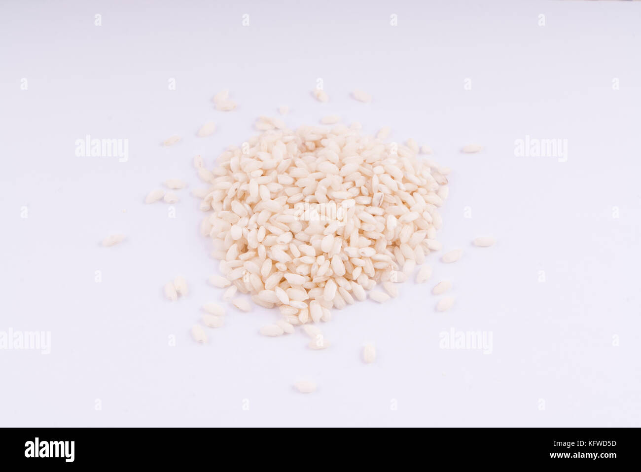 Rice on a white background Stock Photo - Alamy