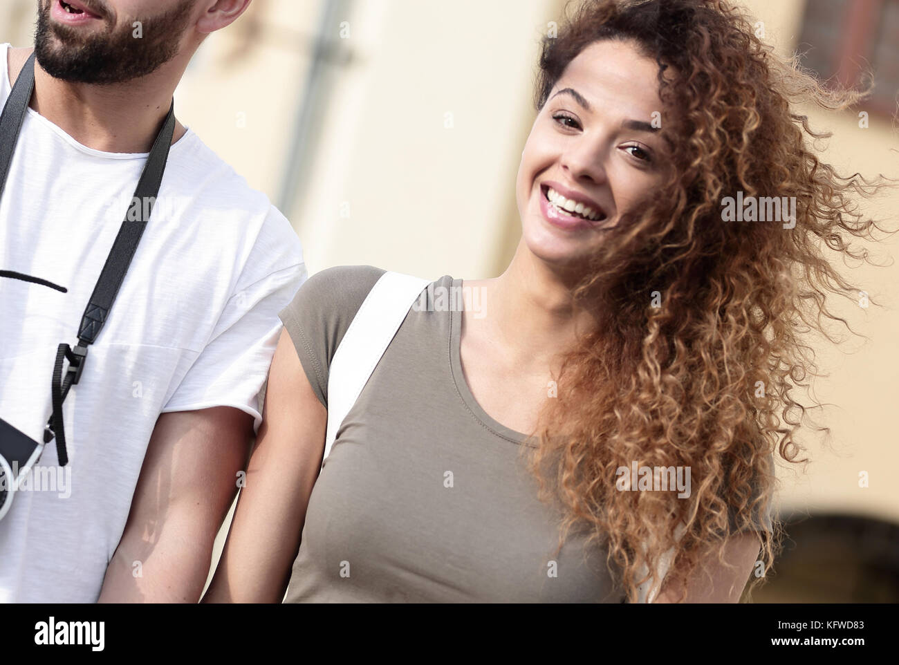 Happy smiling tourists walking and enjoying the view Stock Photo - Alamy