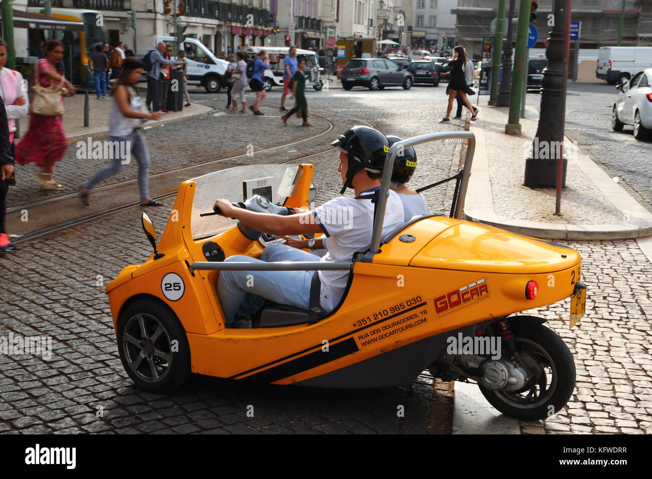 With a Three-wheeler through Lisbon, Portugal Stock Photo - Alamy