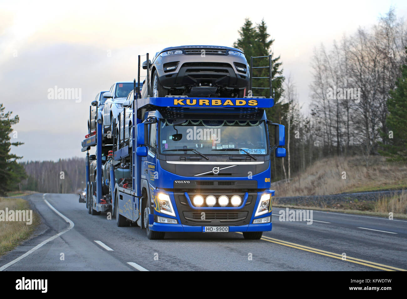 SALO, FINLAND – DECEMBER 11, 2015: Volvo FM car transporter hauls Range ...