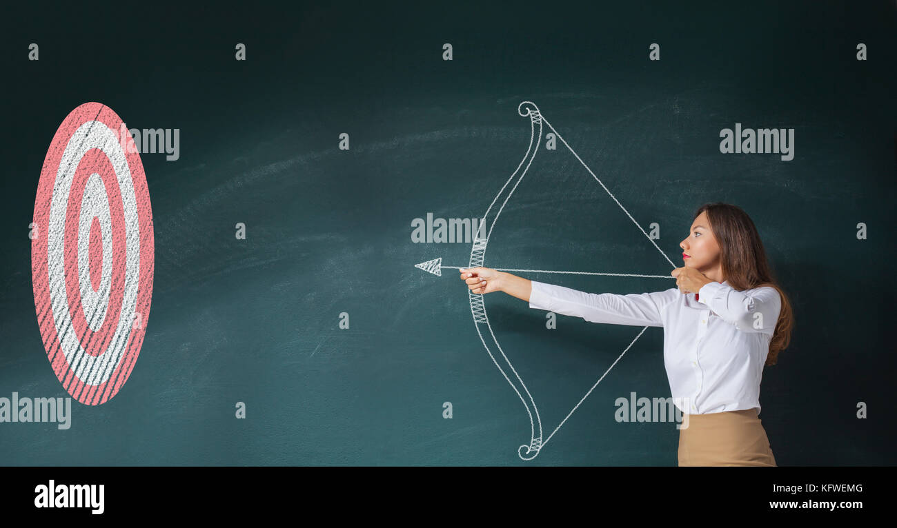 Young woman aiming her goal Stock Photo - Alamy