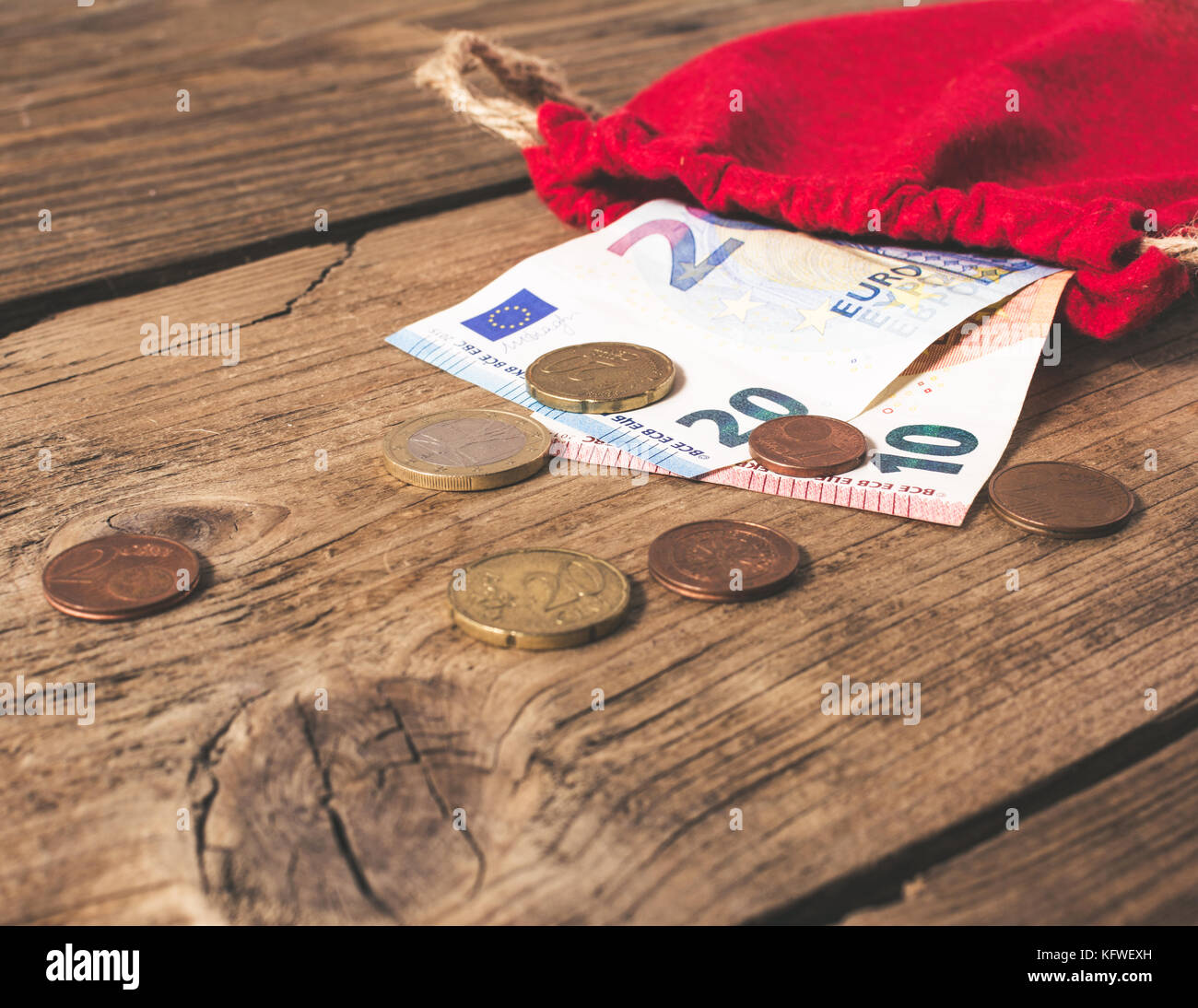 Santa and sack of money hi-res stock photography and images - Alamy