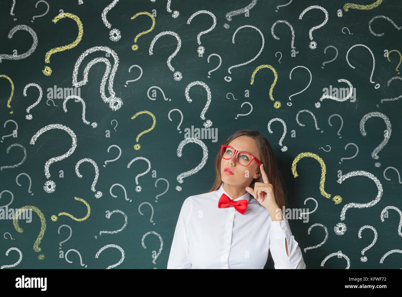Woman thinking question marks hi-res stock photography and images - Alamy
