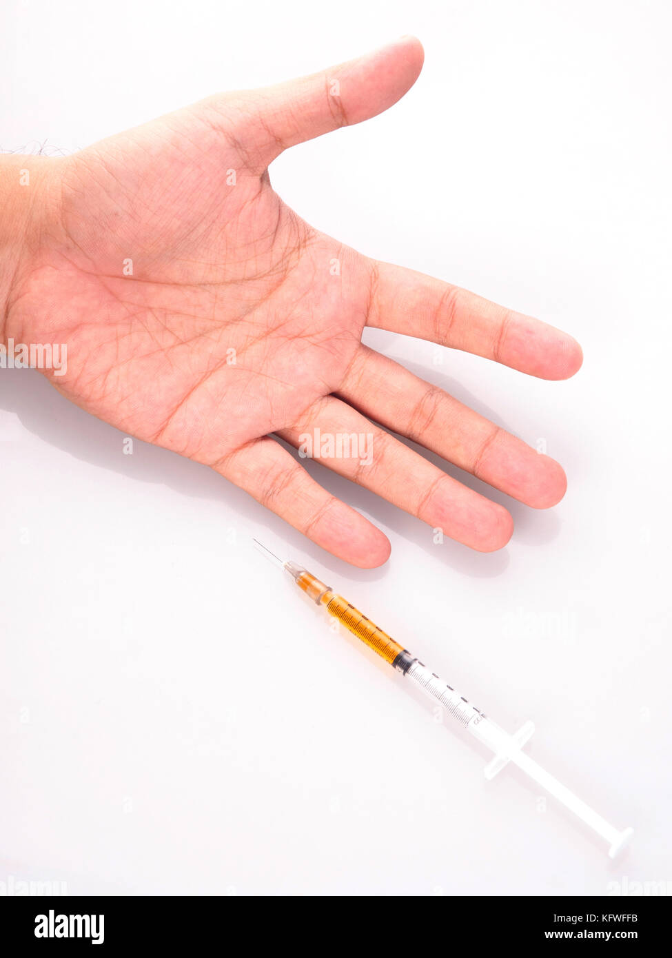 male hand with syringe Stock Photo - Alamy
