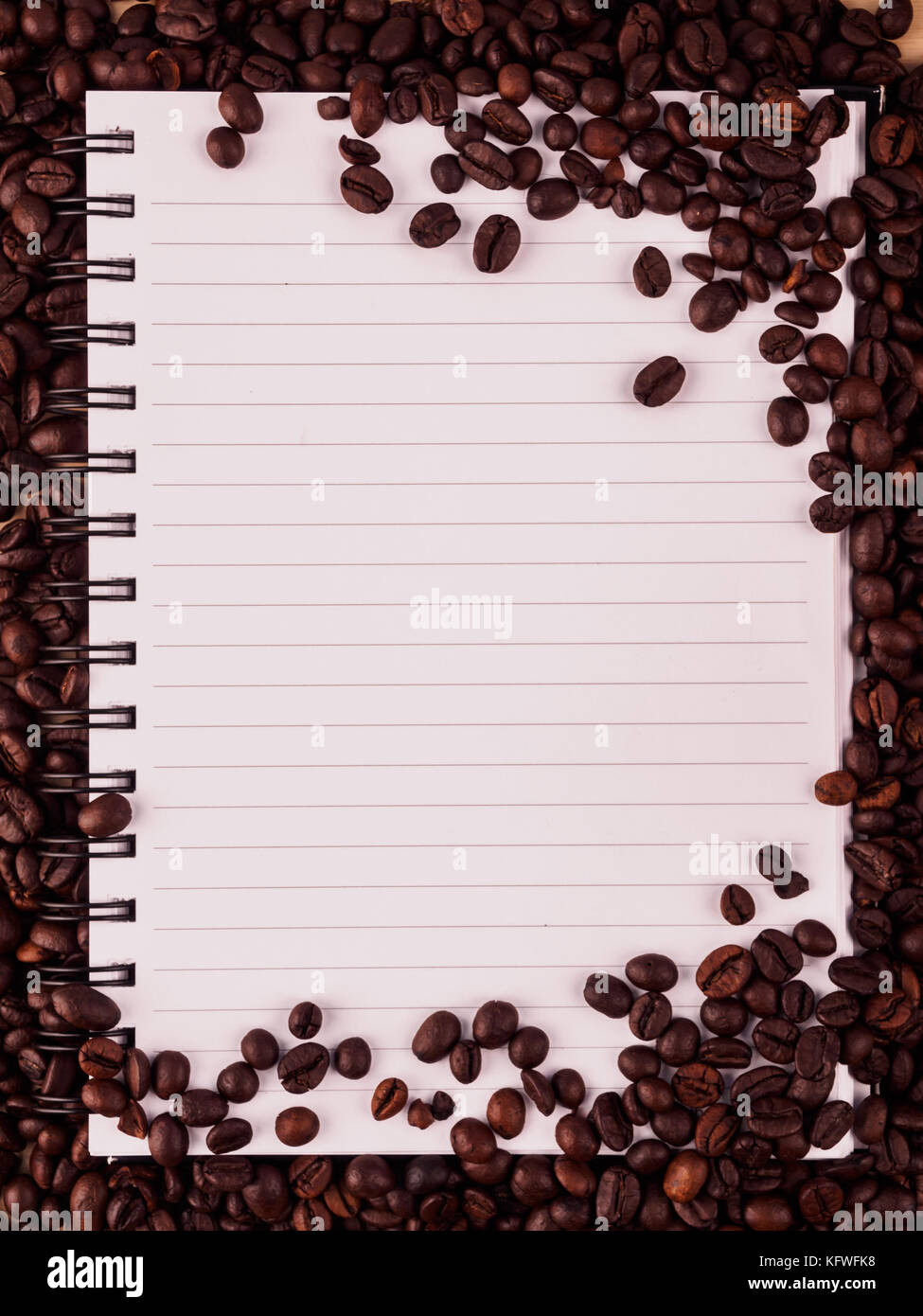 coffee beans and notebook Stock Photo - Alamy