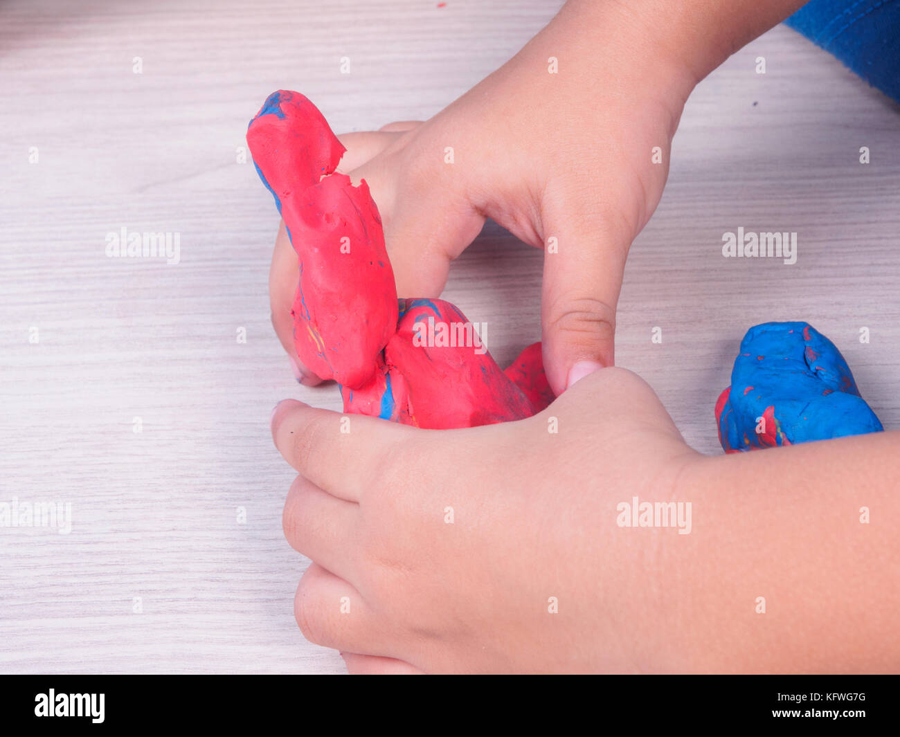 closeup of child play modeling clay Stock Photo - Alamy