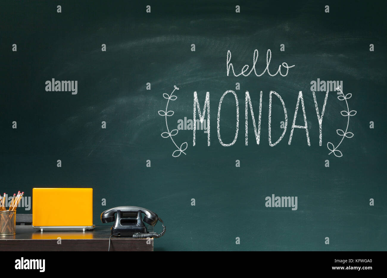 Hello Monday! words writing on chalkboard Stock Photo - Alamy