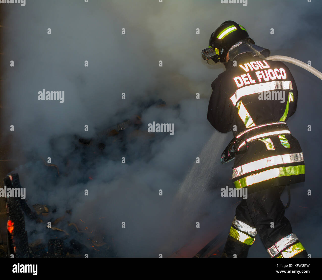 Firefighter in action hi-res stock photography and images - Alamy