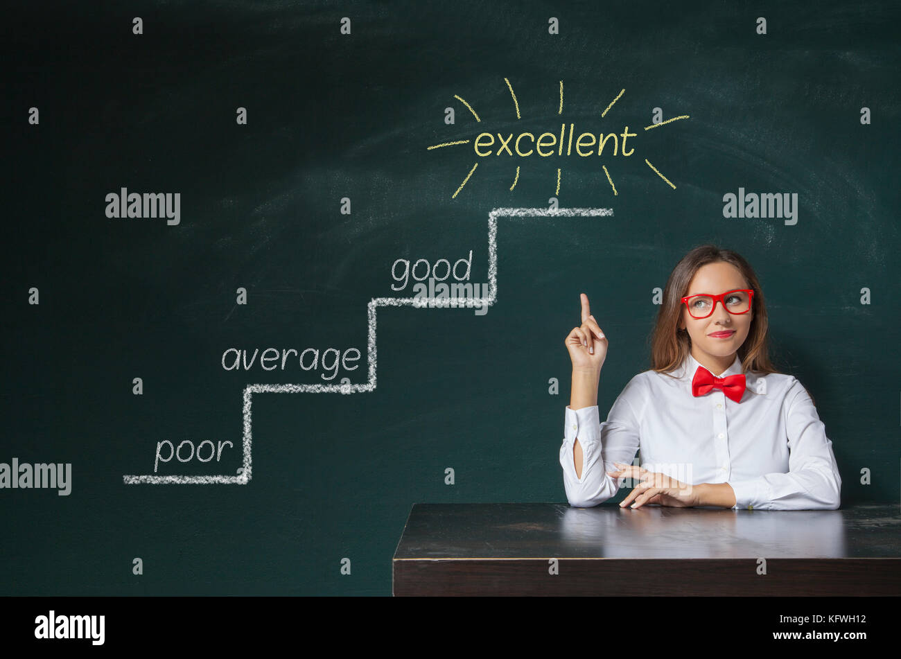 Drawing ladder of success in blackboard Stock Photo - Alamy