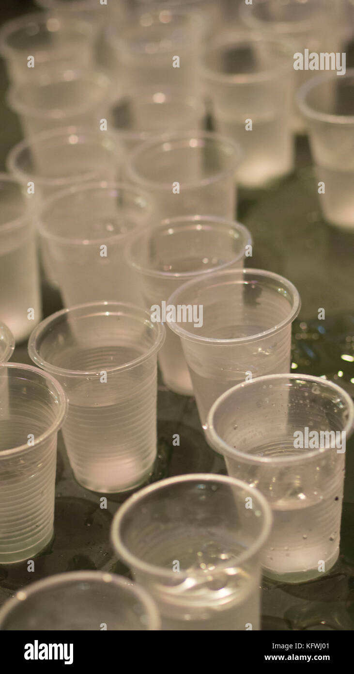 Plastic cups with water Stock Photo - Alamy