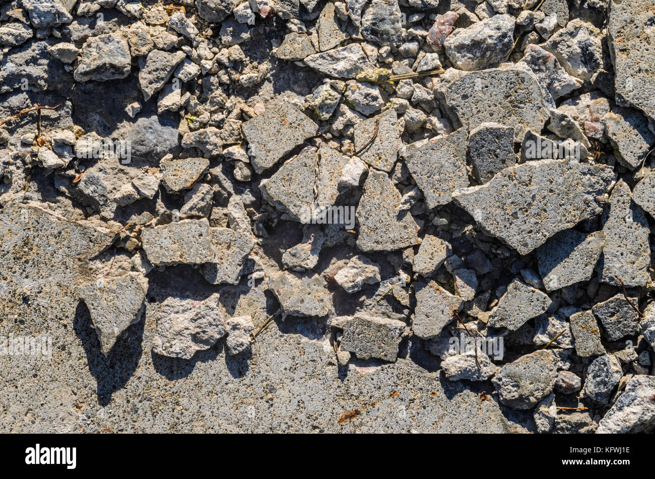 Destroyed concrete floor texture. Large broken pieces of concrete ...