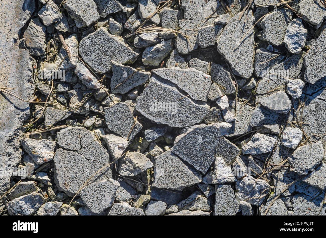 Destroyed concrete floor texture. Large broken pieces of concrete ...