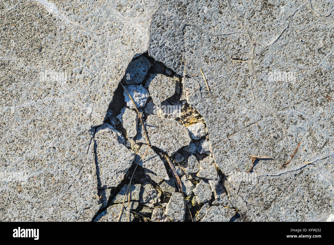 Destroyed concrete floor texture. Large broken pieces of concrete ...