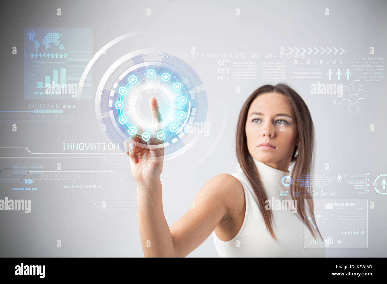 Attractive young woman touching the virtual future interface Stock ...