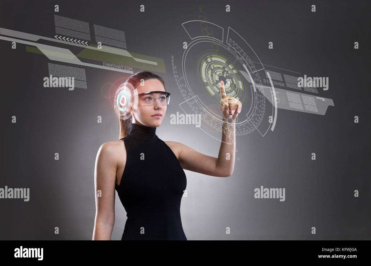 Attractive young woman touching the virtual future interface Stock ...