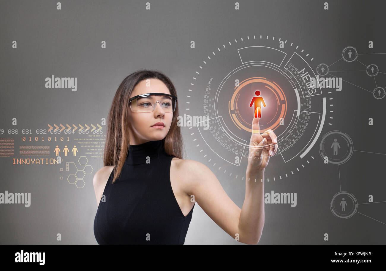 Young woman touching the virtual future interface Stock Photo - Alamy
